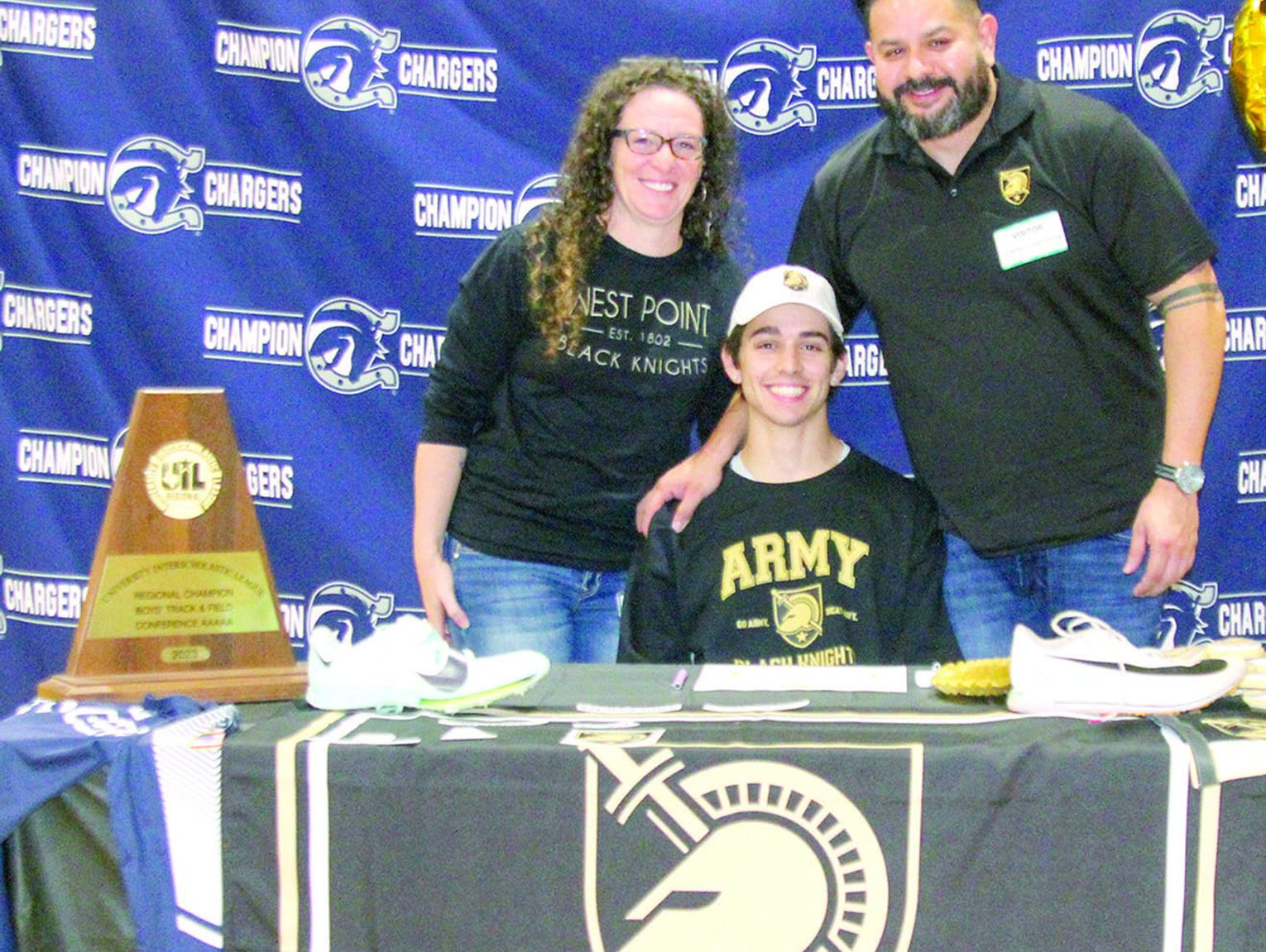 Brace signs with West Point