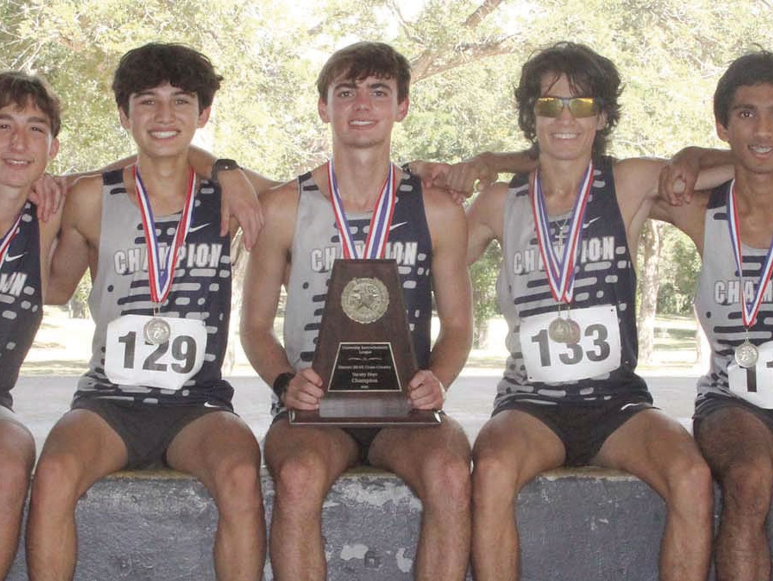 Champion cross country teams both advance to regionals