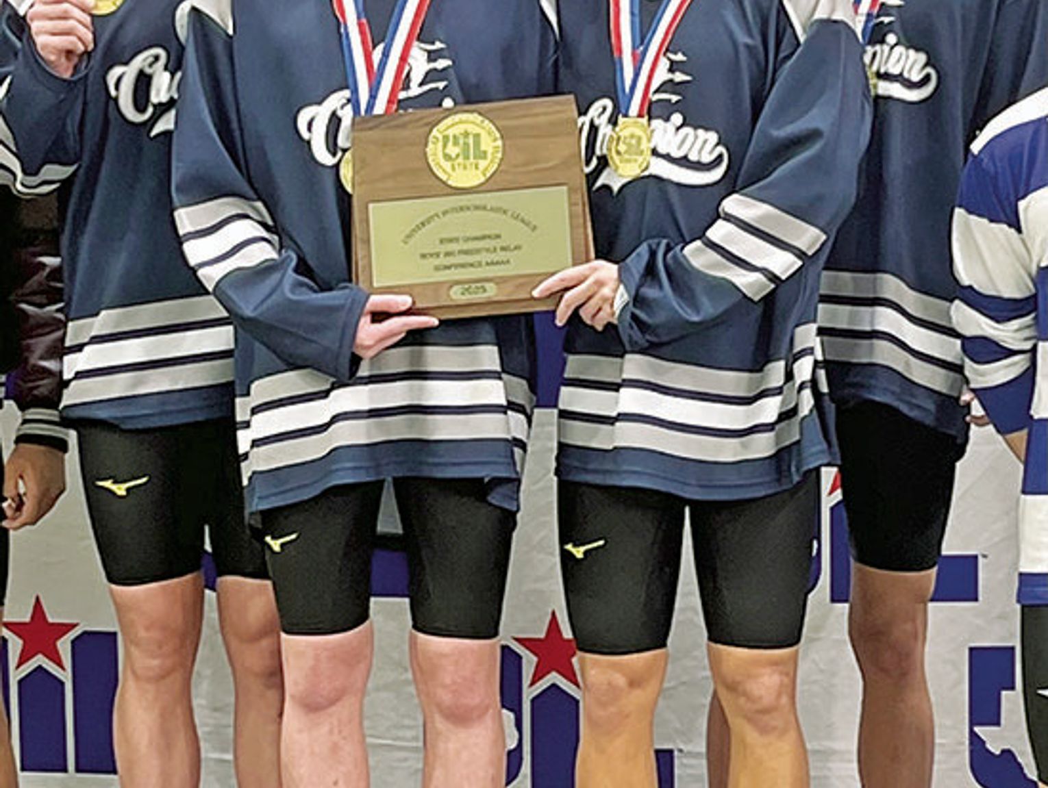 Champion swimmers have record day as Lady Chargers are crowned ...