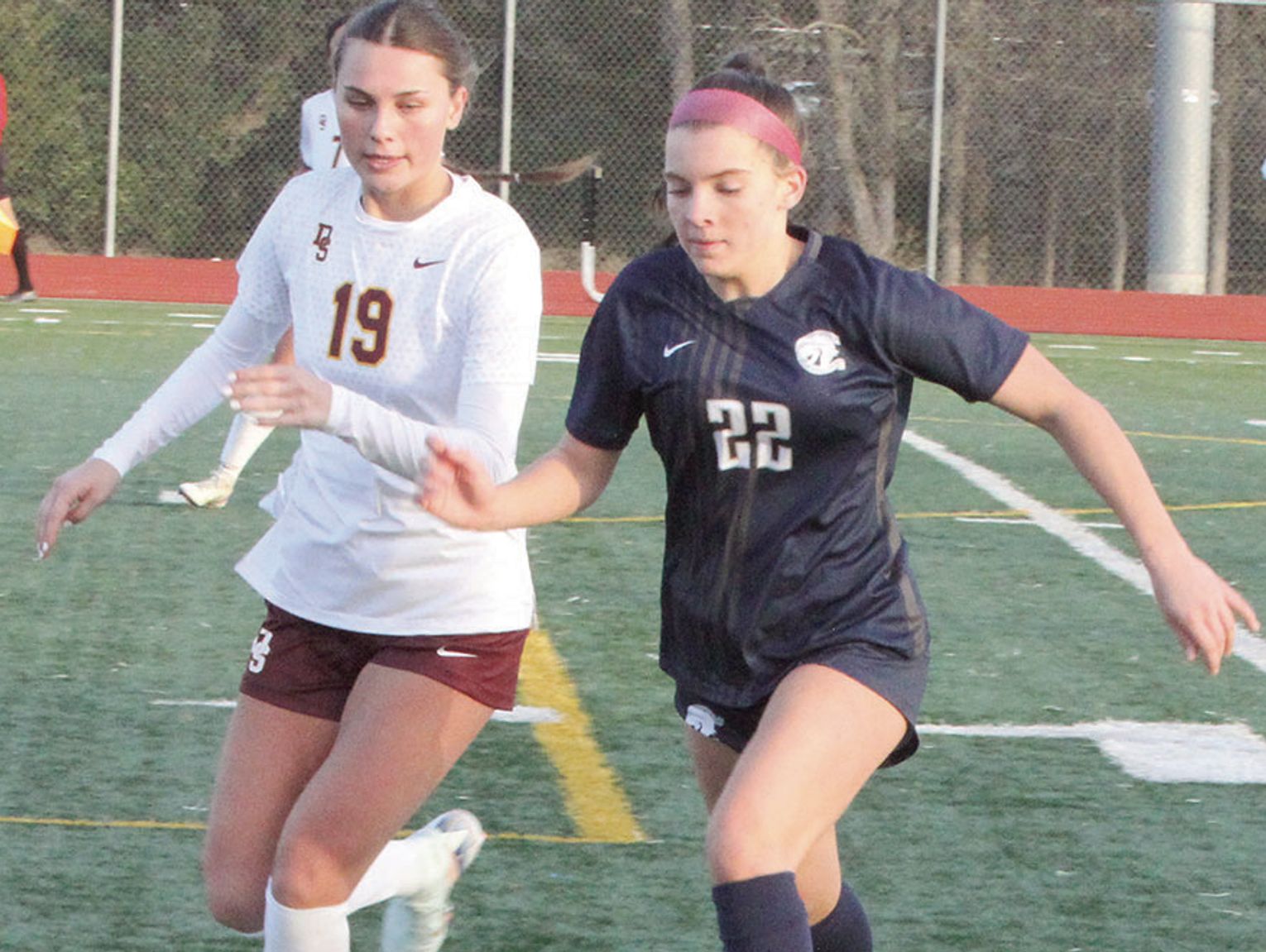 Lady Chargers trap Tigers for first win