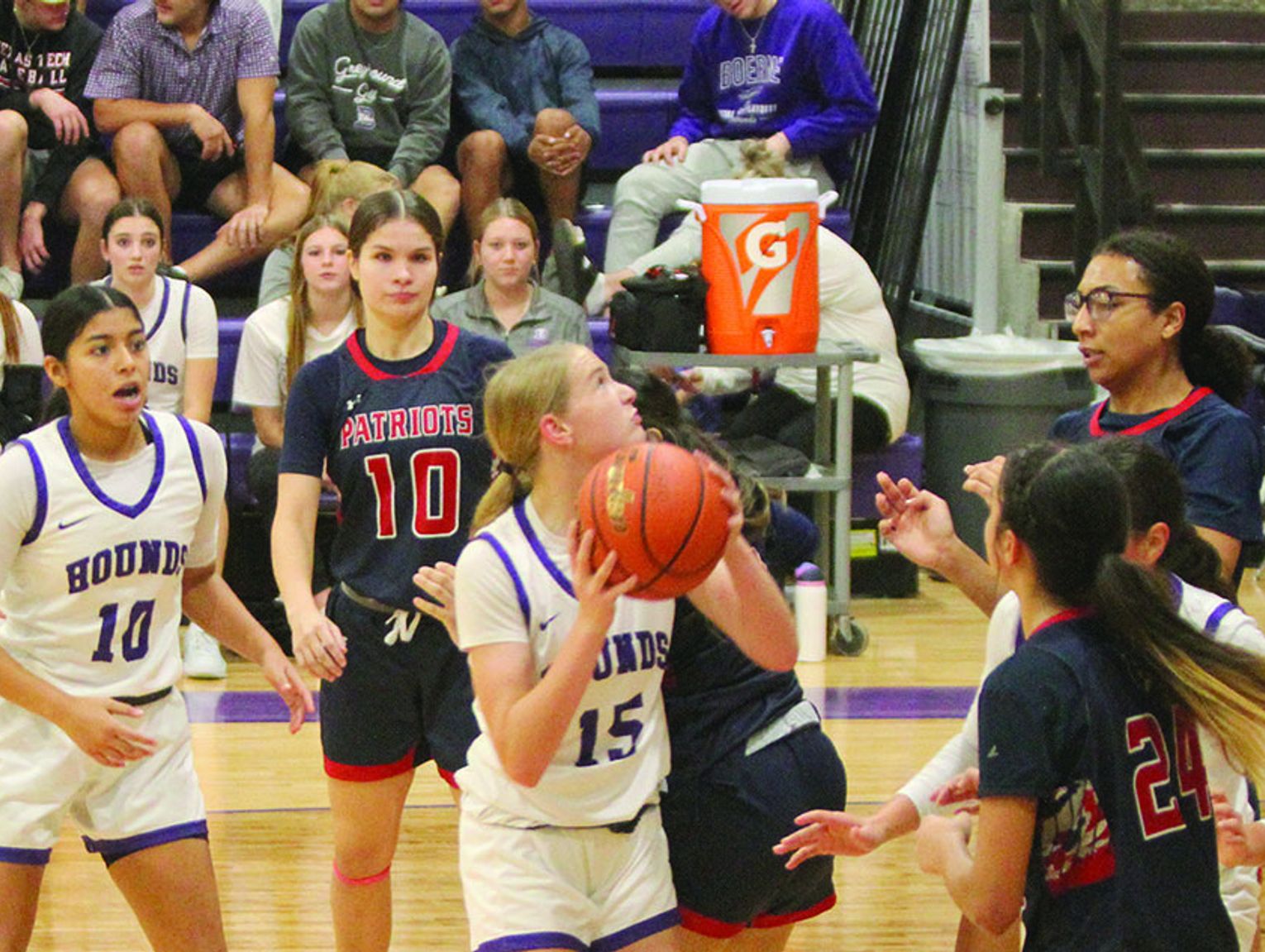 Lady Hounds pick up first district victory