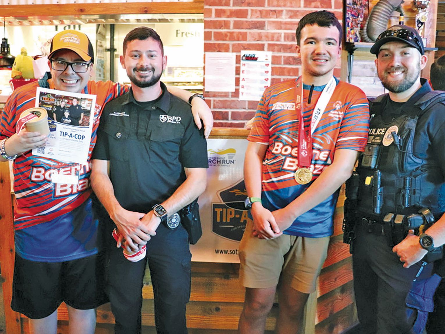 Officers take orders, serve food for Blaze fundraiser