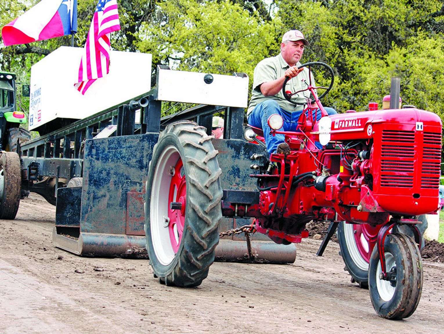 Pushing his tractor to its limit