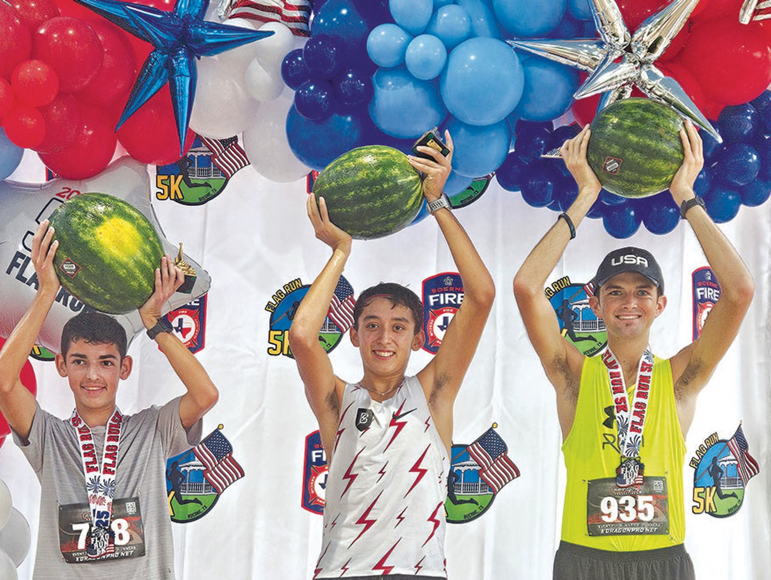 Record turnout shows for Flag Run 5K, despite rain